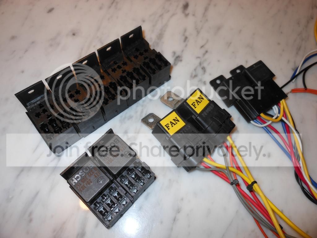 Any reason not to mount (Dewitt's) Spal fan relays back in the battery ...